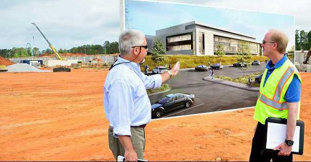 Touring Baxter's work site - The Covington News