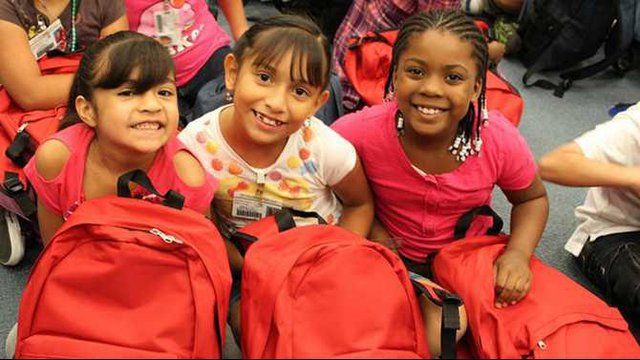 New school bags for J.H. House - The Covington News