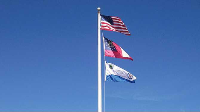 Newton County Theme School raises blue ribbon flag - The Covington News