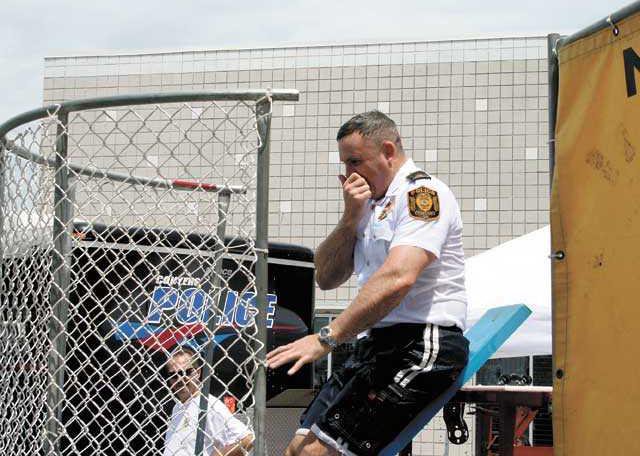 Dunk a cop, raise funds for Explorers program - The Covington News